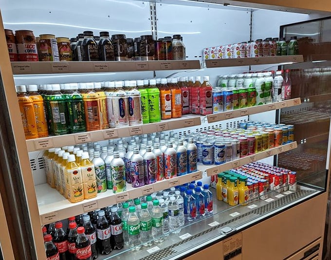 The beverage case at Belle's is like the United Nations of refreshment—Japanese sodas rubbing shoulders with American classics.