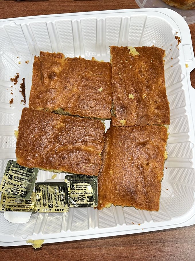 Golden cornbread squares that strike the perfect balance between sweet and savory – the ideal sauce-sopping companion.