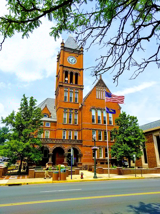 The courthouse's distinctive orange brick and soaring clock tower have witnessed countless town celebrations, political debates, and everyday moments of justice.