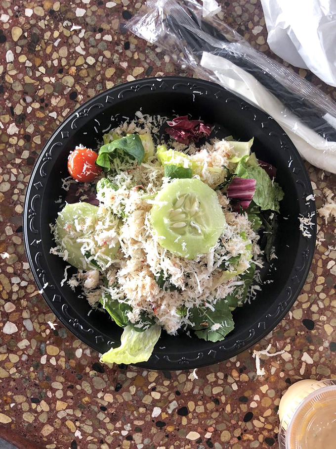 A crab salad that respects the seafood enough to let it shine. No drowning in mayo here – just fresh ingredients having a delicious conversation.
