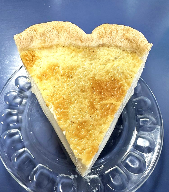 Custard pie with a bronzed top that crackles under your fork—the kind of dessert that launches a thousand "my grandma used to make" stories.