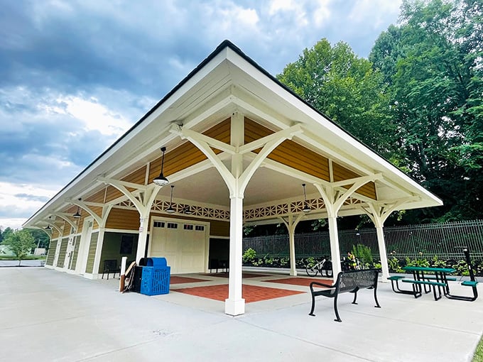 This elegant pavilion offers shelter from summer storms and winter chills, its crisp white columns bringing a touch of Southern charm to outdoor gatherings.