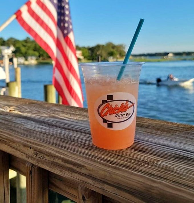 A sunset-colored crush cocktail with the perfect backdrop – nature's way of saying "take a photo now, thank me later."