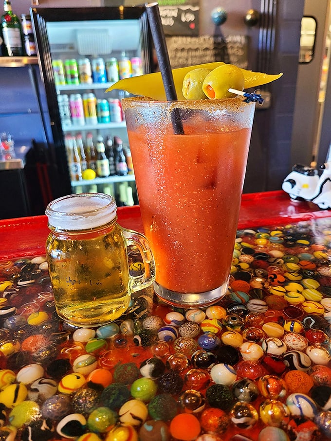 That colorful counter isn't just functional—it's a work of art embedded with marbles, making waiting for your Bloody Mary an experience itself.