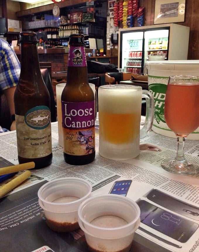 Cold beer and newspaper-covered tables—the unofficial uniform of Maryland crab feasting. Dogfish Head meets blue crab in perfect harmony.