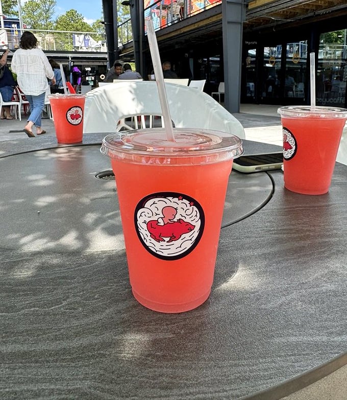 These vibrant red drinks aren't just refreshing—they're strategic palate cleansers between bites of smoky goodness. Hydration with style points. 