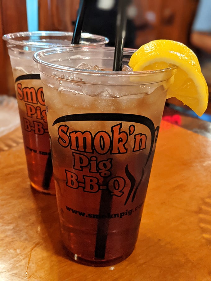 Sweet tea in branded cups—the unofficial champagne of the South. Refreshing enough to cut through the richest barbecue with that perfect lemony finish.