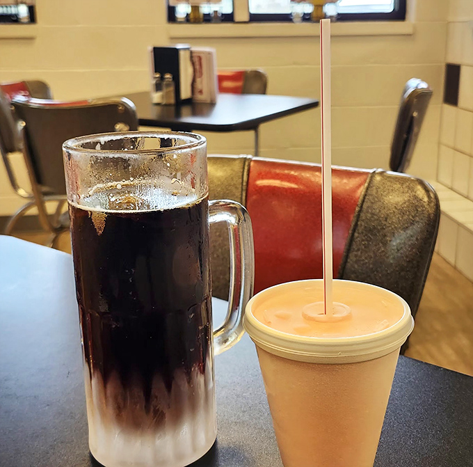 Root beer in a frosted mug alongside a shake—the coldest relationship that'll warm your heart. One sip and you're eight years old again.