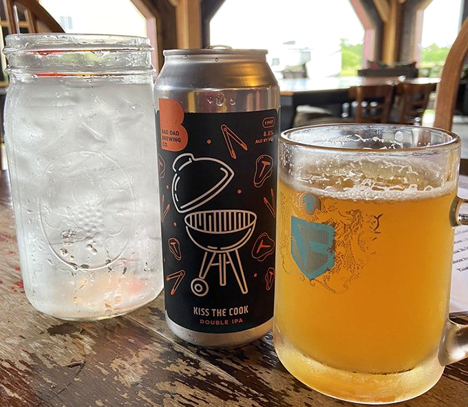 Nothing complements British pub fare like a proper pint, served in a glass mug that catches the light just right.
