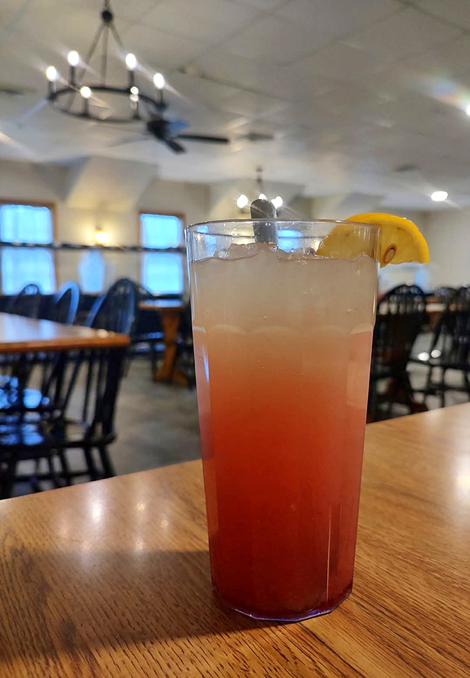 That gradient of color isn't just pretty—it's the visual promise of a refreshing sweet-tart symphony in a glass.