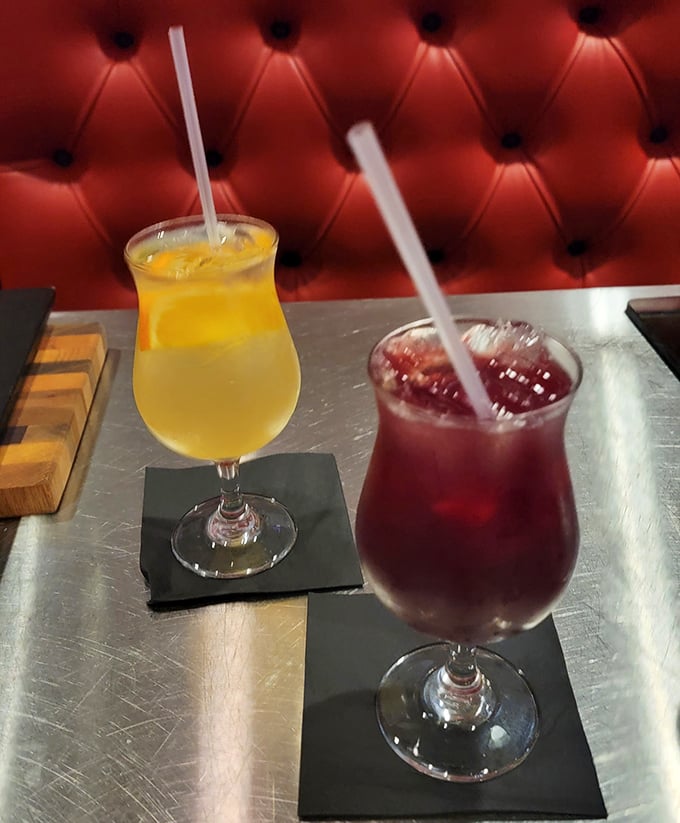 Cocktails that complement rather than compete with your steak. That red one is practically the same color as the banquettes—coincidence? I think not.