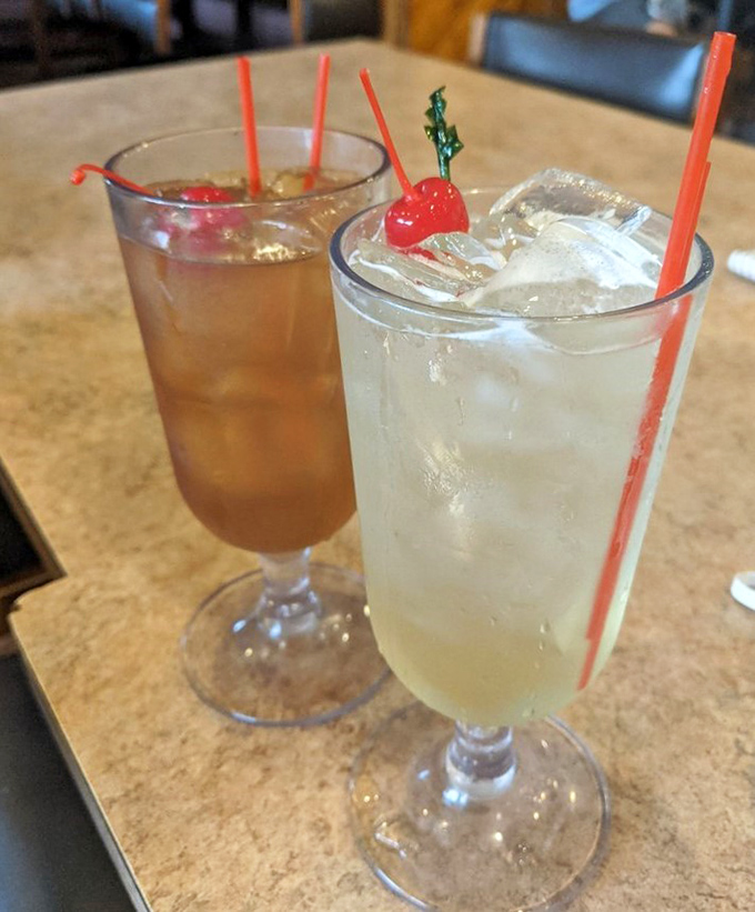 Cocktails that don't need fancy mixologists or ironic mustaches to deliver happiness. That cherry garnish is the exclamation point on your day.