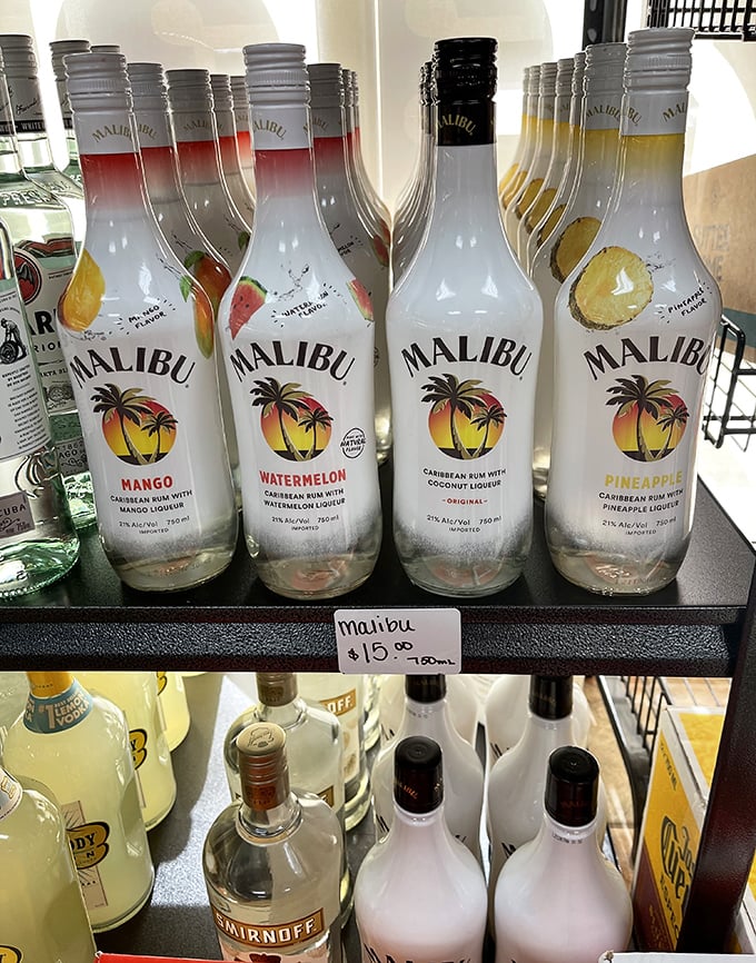 Malibu bottles standing at attention, because sometimes tropical vibes complement Maryland crabs perfectly – who knew?