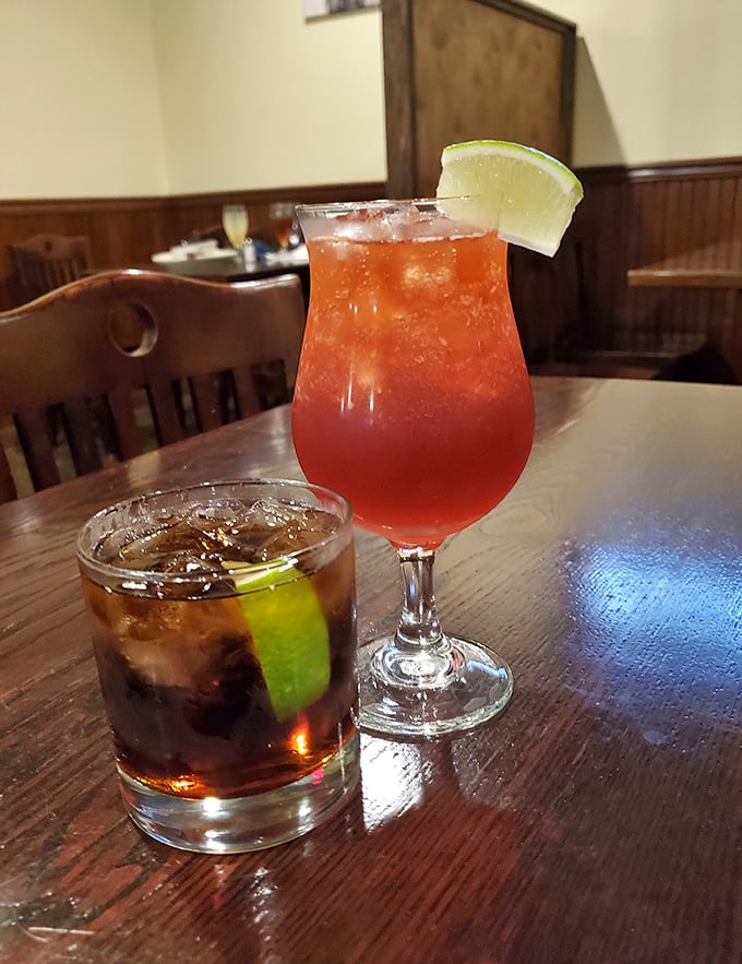 Cocktails that don't need umbrellas to make a statement. That vibrant red drink isn't just Instagram bait—it's a flavor explosion waiting to happen.