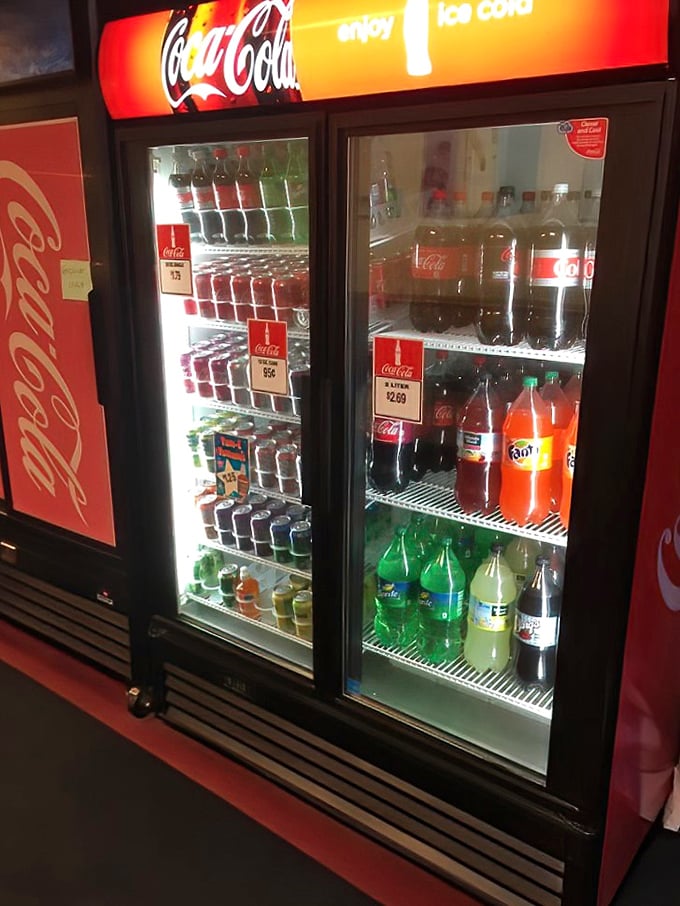 The soda cooler—where decisions are simpler than choosing pizza toppings but just as important to the complete Mama Mia's experience.
