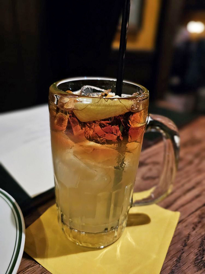 The cocktails at Gulliver's don't just quench your thirst—they tell stories of bygone eras when drinks were strong and conversations were stronger.