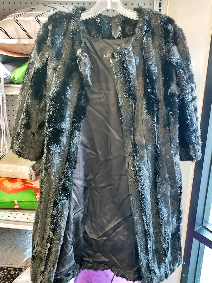 This faux fur coat isn't just a garment—it's an entire personality waiting for the right person to claim it.