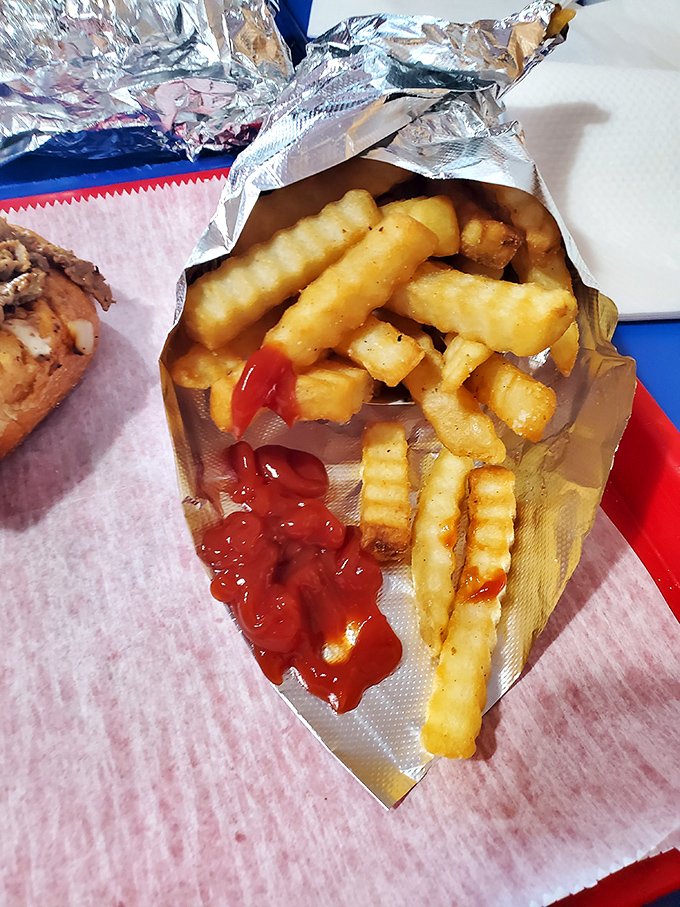 Crinkle-cut fries: the corduroy pants of the food world—unfashionably fashionable and impossibly satisfying with that splash of ketchup.