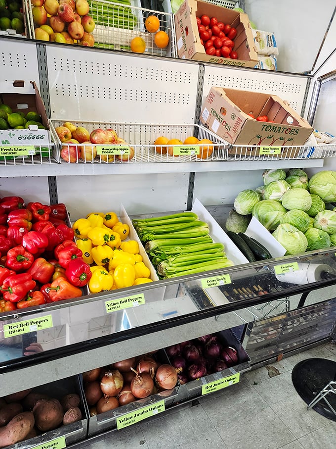 Nature's candy store! These vibrant fruits and vegetables look like they jumped straight from a farm stand into this urban treasure trove.