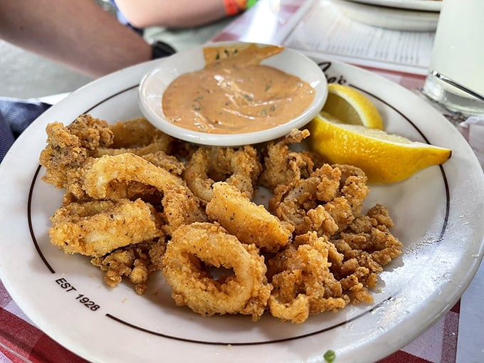 Crispy calamari that would make Mediterranean fishermen nod in approval. That squeeze of lemon isn't optional—it's the exclamation point this dish deserves.