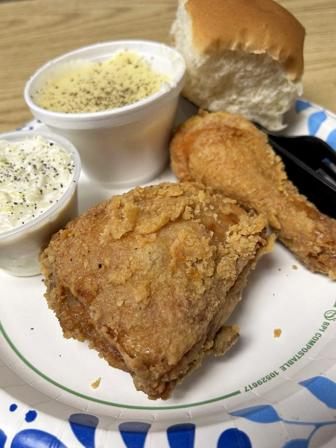 The star of the show in all its glory – chicken with a crust that shatters just right, revealing juicy meat that makes conversation stop mid-sentence.