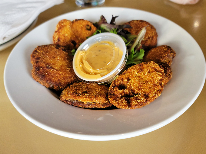 Fried green tomatoes: where tangy fruit meets crispy coating in a Southern handshake that leaves your taste buds wondering why they haven't met sooner.