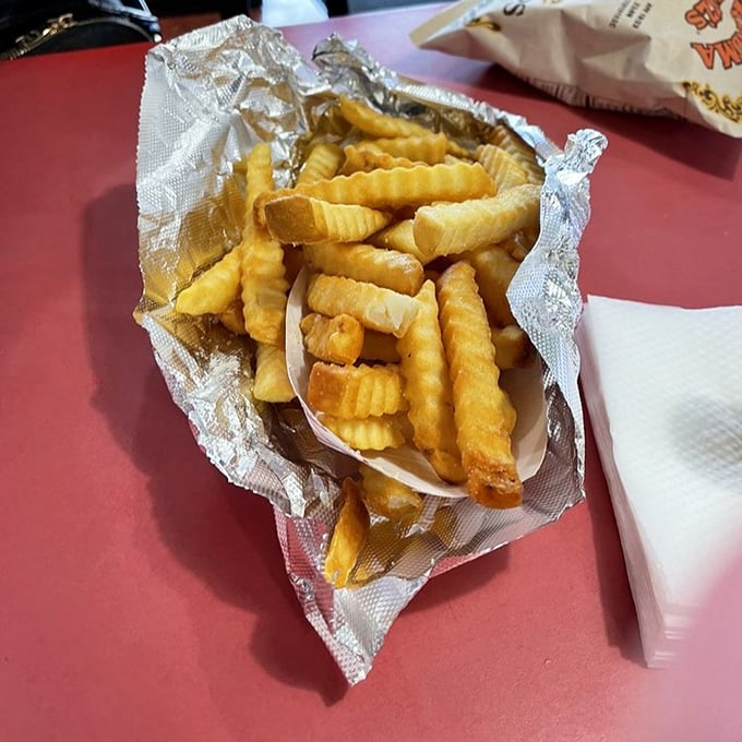These aren't just fries—they're crispy potato soldiers standing at attention, ready to march straight into the hall of simple food perfection.
