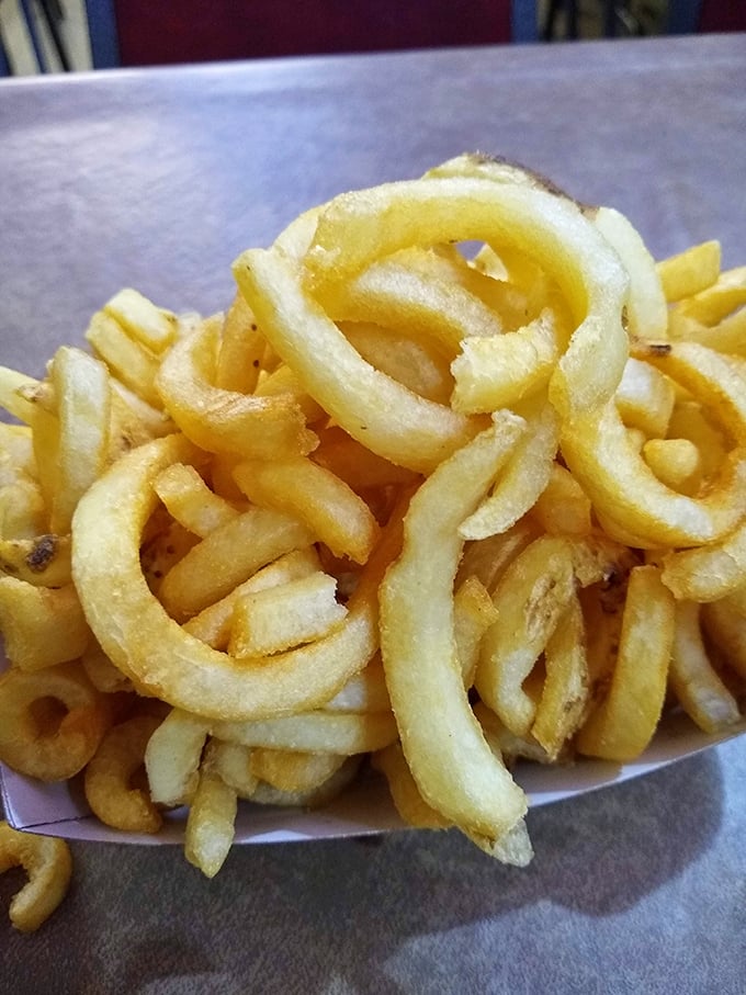 These aren't just onion rings – they're golden halos of crispy perfection that make fast food versions hide in shame.