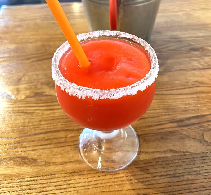 This isn't just a margarita—it's summer in a salt-rimmed glass, the perfect companion for seafood that demands a worthy beverage.