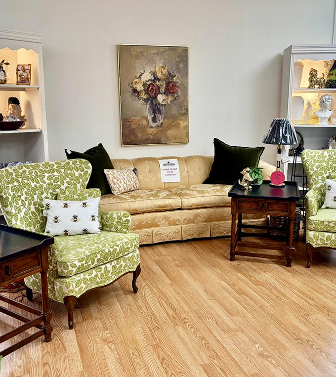 A living room vignette that looks ready for a 1970s cocktail party. Those green chairs have definitely heard some juicy gossip in their day.
