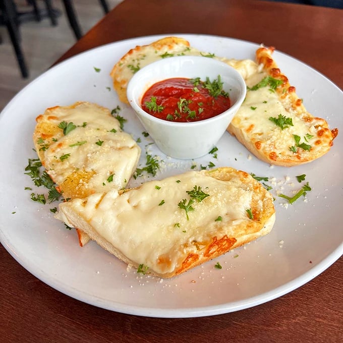 Garlic bread done right – golden, buttery, and guaranteed to make you forget about any diet resolutions.