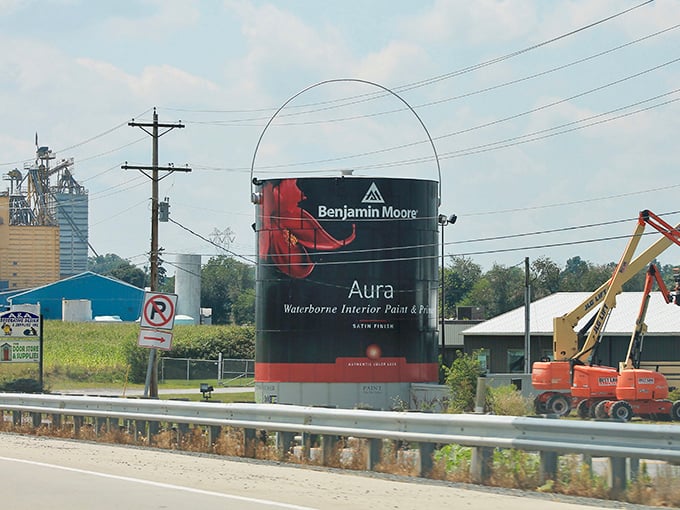 Painting the town red... and black... and white. This massive Benjamin Moore can requires serious equipment for its occasional makeovers.