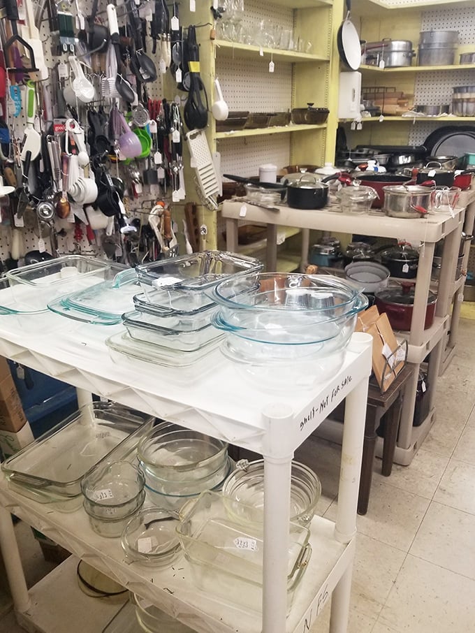 Kitchen treasures await new homes. Those Pyrex dishes have survived from the era when casseroles ruled supreme at neighborhood potlucks.