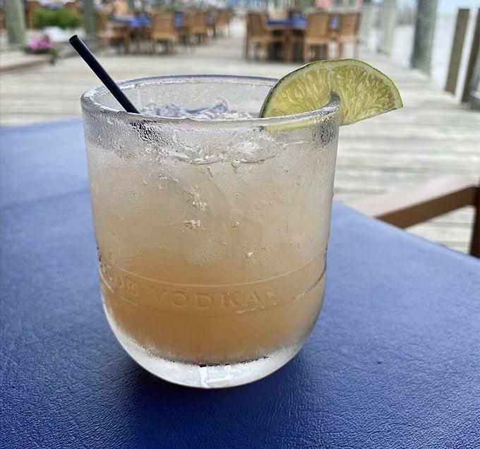 A cocktail with a view—because somehow that tequila tastes even better when you're watching boats drift by on the Murderkill River.
