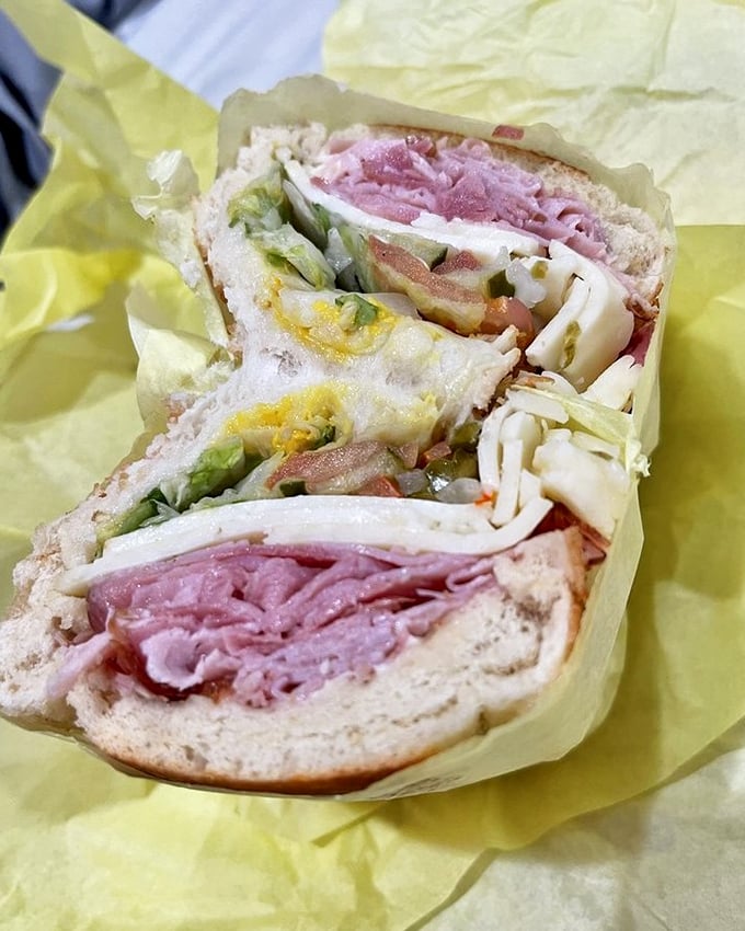 Layer upon layer of ham and cheese, like a delicious archaeological dig where every level reveals new treasures.