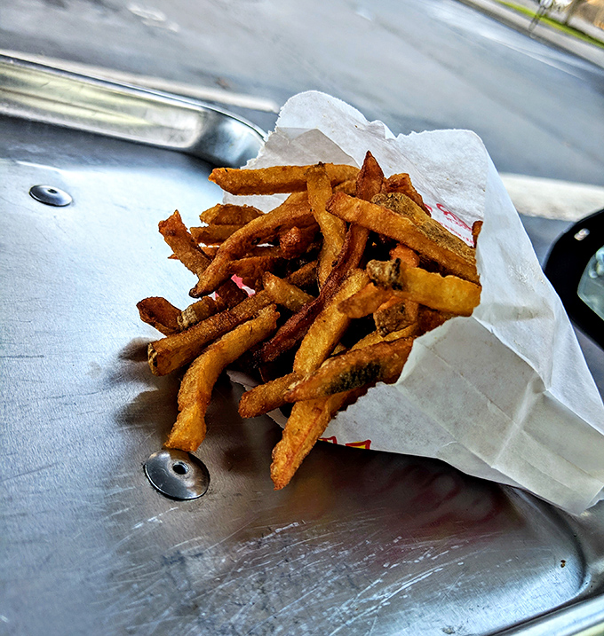These hand-cut fries aren't just a side—they're the supporting actors who sometimes steal the show, crispy on the outside and fluffy within like potato perfection should be.