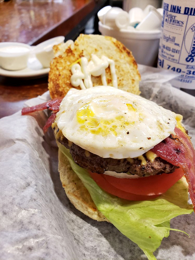 Outdoor dining with a side of burger therapy—the kind of meal that makes you forget whatever troubles you brought to the table.