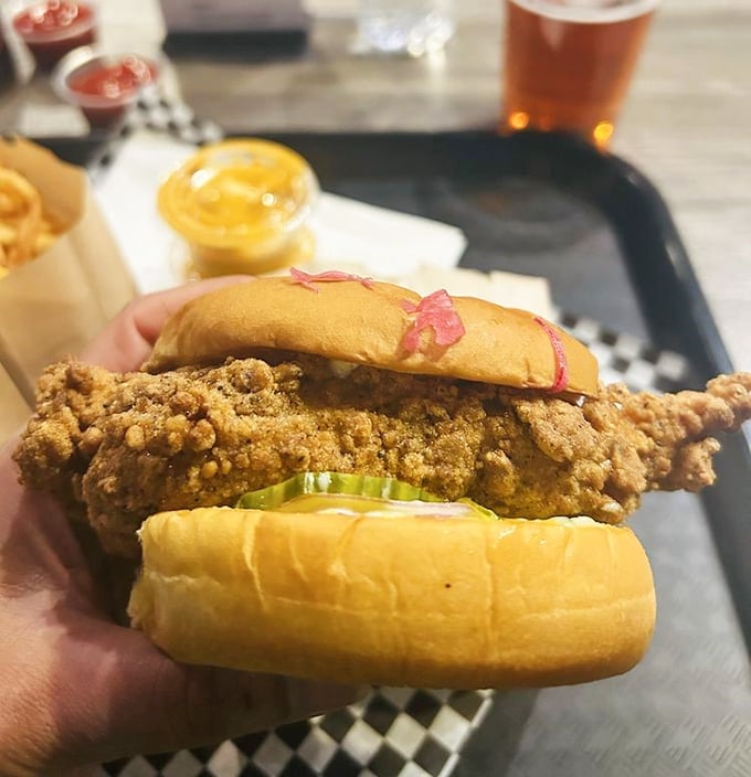 This chicken sandwich isn't messing around – the golden crust practically auditions for its own Broadway show.