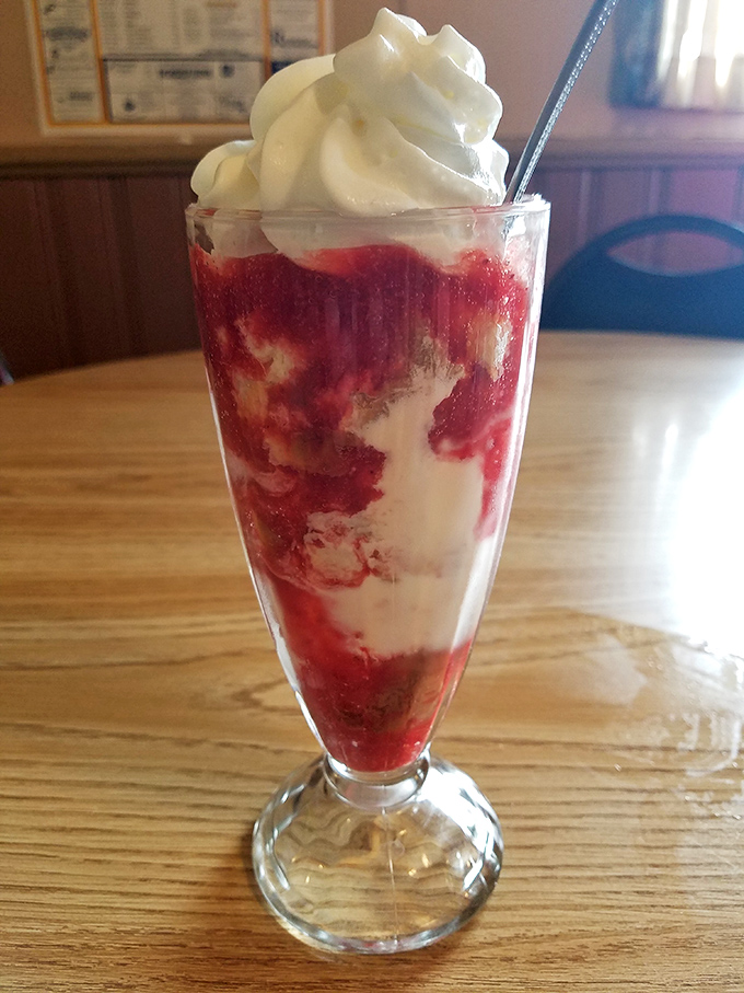 This isn't just dessert—it's a layered memory of childhood summers, served in a glass tall enough to hold your sweetest nostalgia.