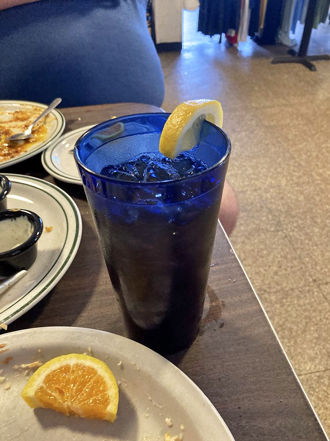 That blue glass of iced tea isn't just a beverage—it's Southern air conditioning in liquid form.