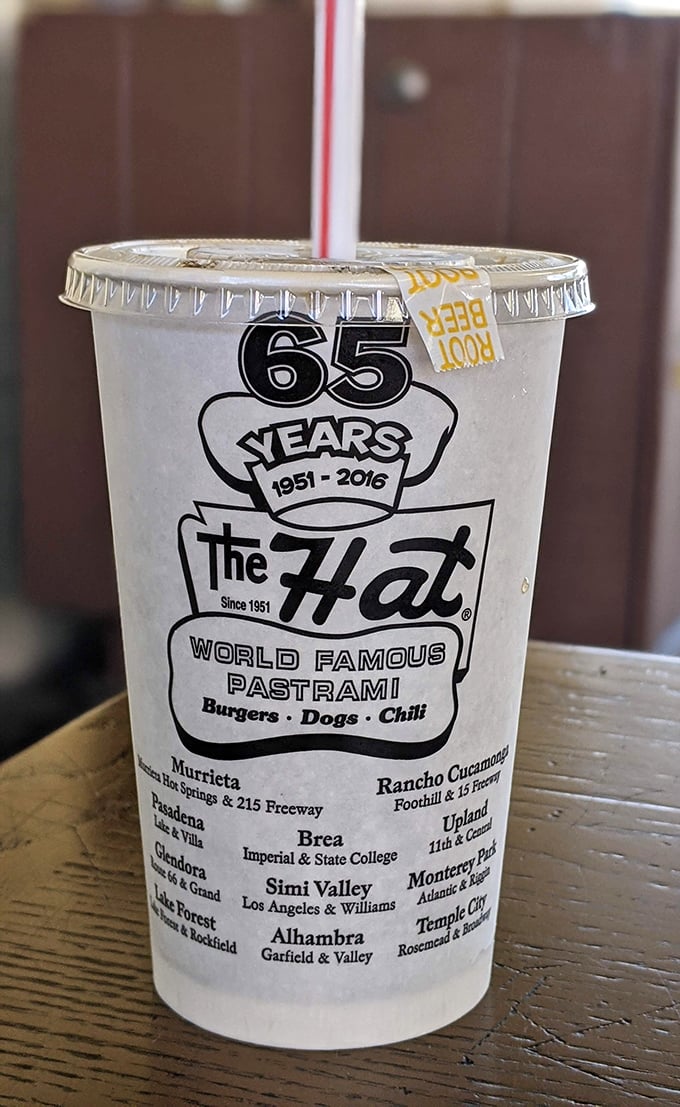 That iconic cup tells a story of California food history—65 years of pastrami perfection that's expanded across Southern California.