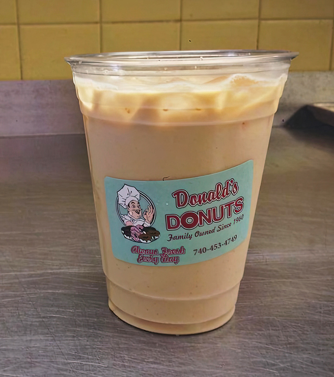 Their iced coffee doesn't need fancy Italian names or artisanal foam art—just the perfect companion for that apple fritter you're eyeing.
