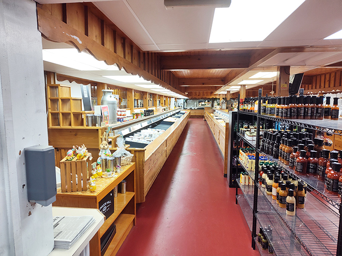 Red floors guide you through a wooden wonderland of dairy delights. The simplicity of the space lets the star attractions—those cheeses—truly shine.