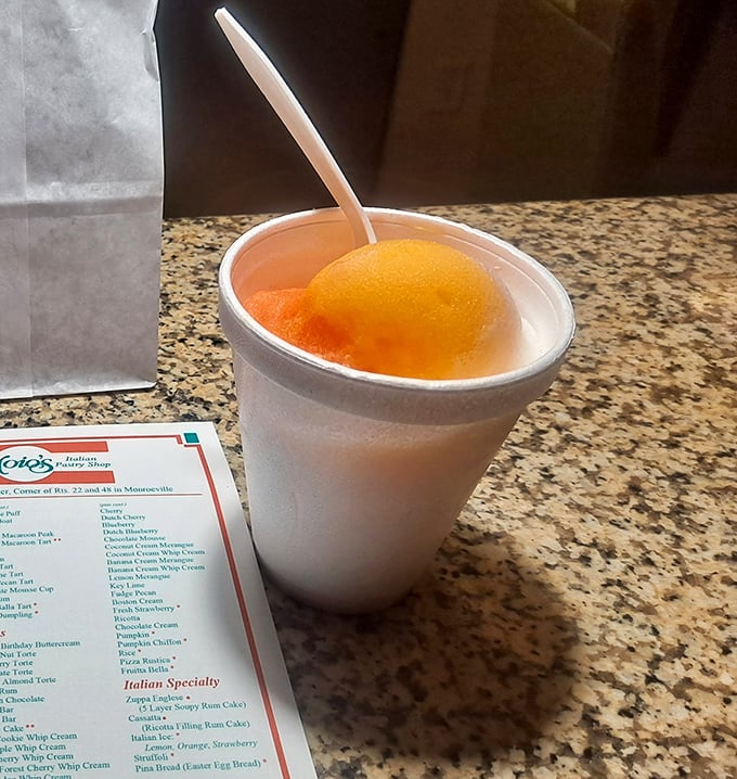 Italian ice – summer's perfect companion. This refreshing orange treat is what your childhood snow cone wishes it could have grown up to become. 