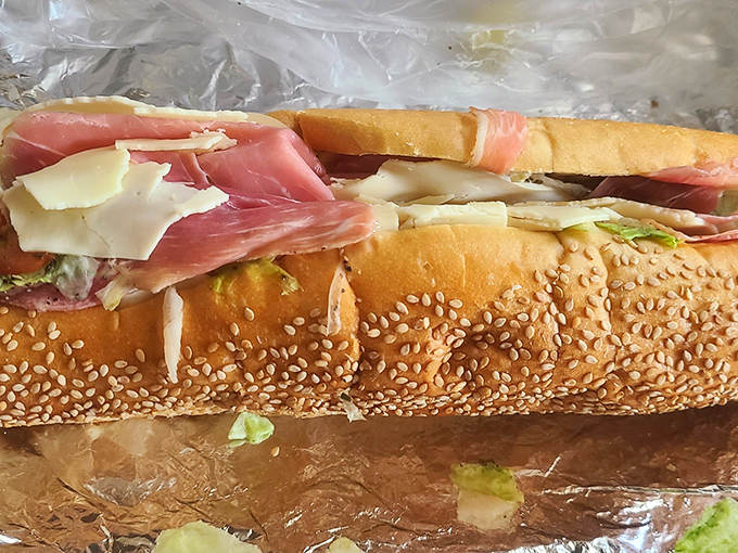 The Italian hoagie—architectural marvel of meat, cheese, and veggies that somehow maintains structural integrity despite being absolutely packed with flavor.