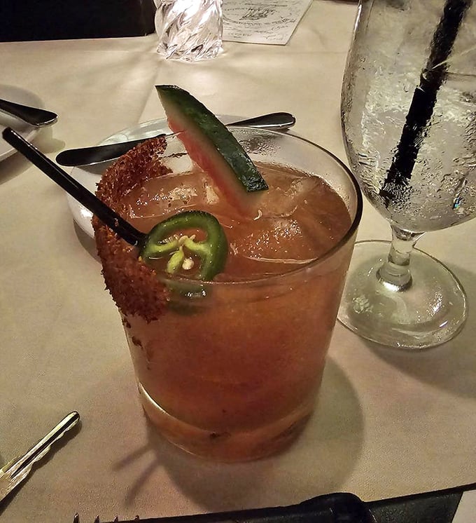 This isn't just a cocktail—it's summer in a glass. The jalapeño slice promises a gentle kick that'll make you forget every mediocre margarita you've ever had.
