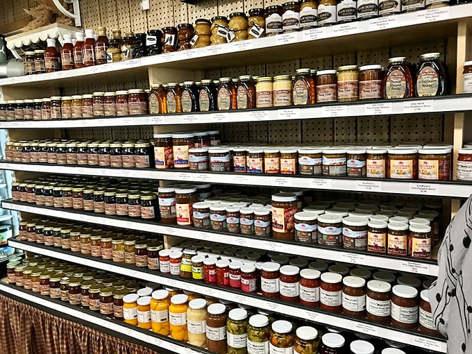 This wall of jams and pickles isn't just preserved food—it's preserved tradition. Each jar contains summer sunshine waiting to brighten winter toast.