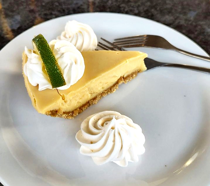 Key lime pie that strikes that perfect balance between tart and sweet – the culinary equivalent of a perfect Florida sunset, complete with whipped cream clouds.