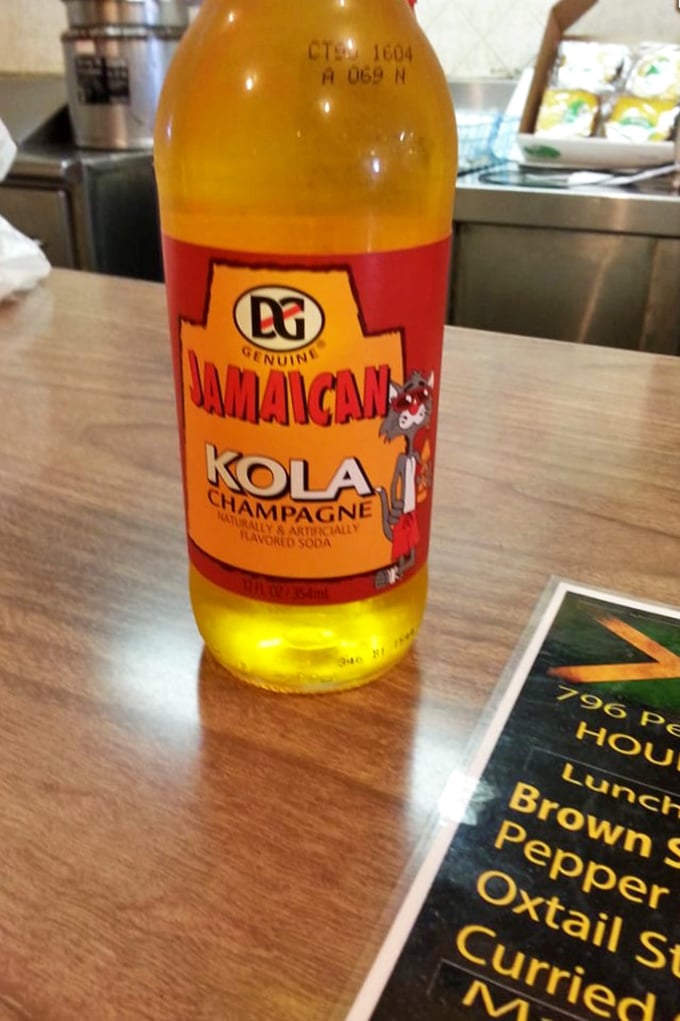 Jamaican Kola Champagne—a vibrant, sweet soda that's the perfect counterpoint to spicy island flavors, no passport required.
