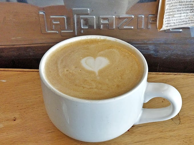 A latte with heart – literally and figuratively – proving that sometimes the simplest pleasures are the ones worth driving across town for.